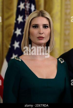 President Donald Trump attends a Hanukkah reception as guests gather ...