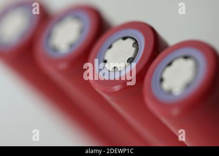Red rechargeable lithium-ion batteries four pieces concept Stock Photo ...