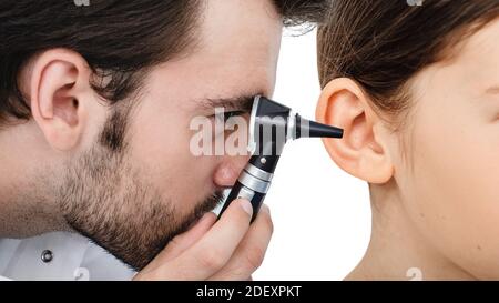 Otitis media. Close-up of the ear of a 14-month- old boy suffering from ...