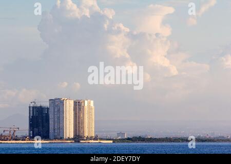 Commercial buildings in Manila as seen from Manila Bay, Philippines ...