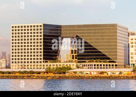 Commercial buildings in Manila as seen from Manila Bay, Philippines ...