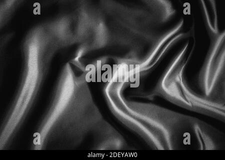 Wrinkle black satin cloth texture background Stock Photo - Alamy