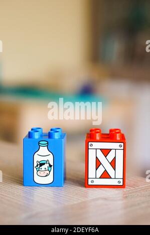 Lego Duplo blocks on a floor Stock Photo - Alamy
