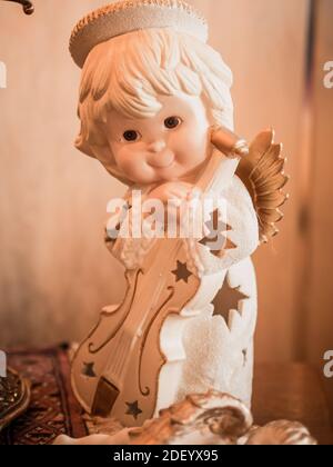 Christmas angel statue with bokeh Stock Photo - Alamy