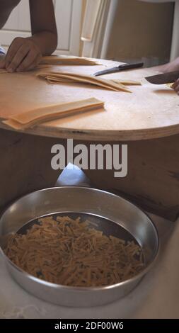 A vertical shot of pasta making process Stock Photo - Alamy