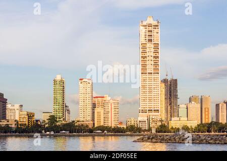 Commercial buildings in Manila as seen from Manila Bay, Philippines ...