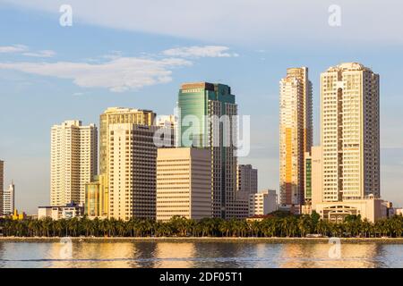 Commercial buildings in Manila as seen from Manila Bay, Philippines ...