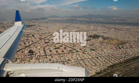 Flying above Mexico City Stock Photo - Alamy