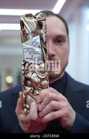 Alexis Manenti poses with the Best Newcomer award for the movie Les ...