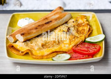 healthy breakfast plate with omelette grilled paneer and fresh cucumber ...