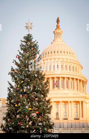 The sun sets on the U.S. Capitol building, Thursday, March 4, 2021, in ...