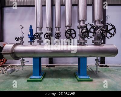 Steam header at industrial processing plant, used to distribute steam ...