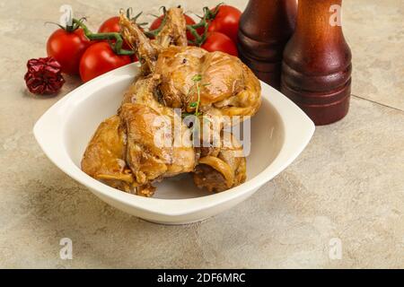 Rabbit stew in sweet and spicy sauce Stock Photo - Alamy