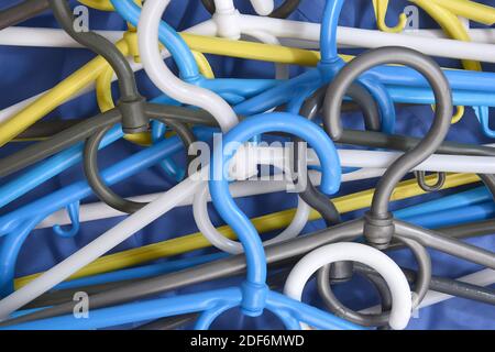 Many clothes hanger. Trempel on a blue background. Store concept for ...