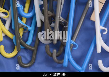 Many clothes hanger. Trempel on a blue background. Store concept for ...