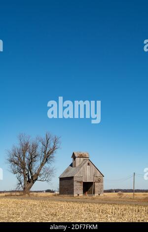 Abandoned buildings in a barren landscape, ghost town of Enilchek in ...