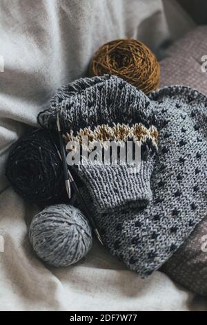 Knitting needles and Knitted wool . Selective focus Stock Photo - Alamy