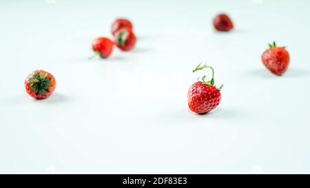 a lot of strawberries on white background Stock Photo - Alamy