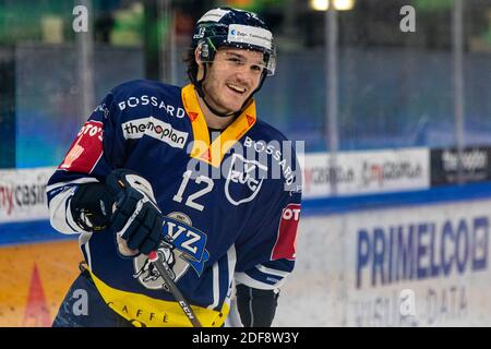 Yannick Zehnder #12 (EV Zug) and #7 Benoit Jecker (Fribourg) fight ...