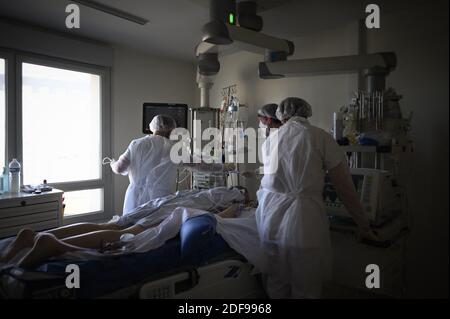 Medical Staff perform a prone decubitus ( decubitus ventral )on a ...