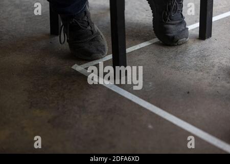 Sebastian Silvera, the owner of Puerto Madero, sits in a marked location at his restaurant in ...