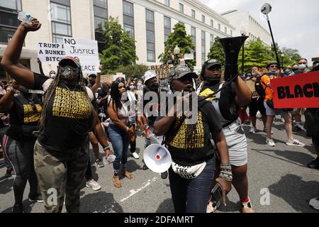 Demonstrators gather to protest the death of George Floyd, a black man ...
