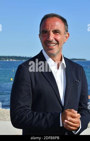 Nikos Aliagas attending the inauguration of his photos exhibition ...