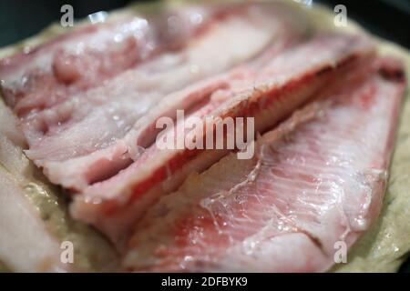 Cooking pie from fillet of muksun fish Stock Photo - Alamy