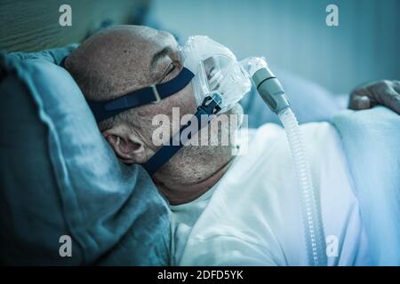 Patient suffering Obstructive Sleep Apnea Syndrome (OSAS) connected ...