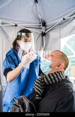 Private nurse in partnership with a pharmacy carries out an antigenic ...