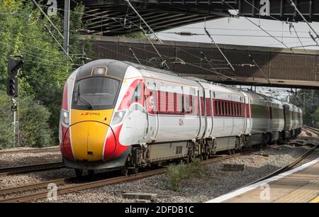 Azuma high speed train in LNER livery speeding through a railway station in the UK Stock Photo ...