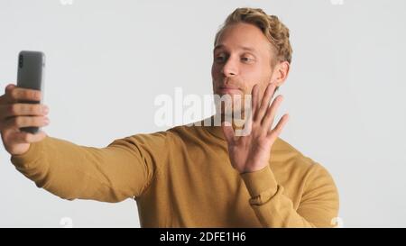 friends with smartphone over white background Stock Photo - Alamy