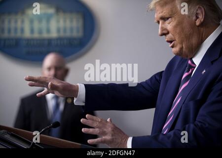 US President Donald J. Trump responds to a question from the news media ...