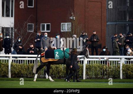 Racegoers around the parade ring ahead of the opening race at Aintree ...