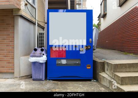 Empty white shelves of standard office vending machine Stock Photo - Alamy