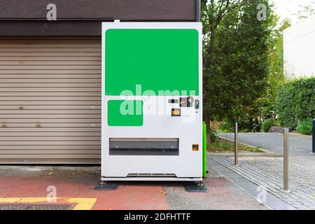 Empty white shelves of standard office vending machine Stock Photo - Alamy