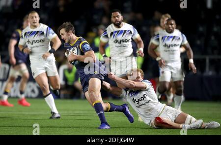 Bath Rugby's Miles Reid tackled by Ulster Rugby's James Mcnabney and ...