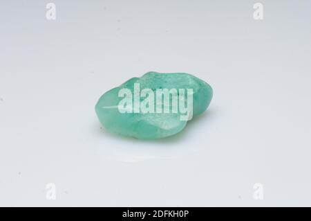 Natural chrysoprase stone on white background Stock Photo - Alamy