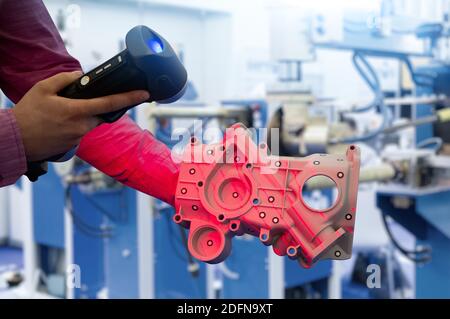 Engineer scans the detail with 3D scanner for reverse engineering Stock ...
