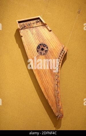 Wooden Gusli on wood background. Ancient East Slavic stringed plucked ...