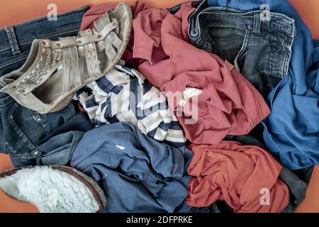 Pile of old dirty clothes. Recyclable textile concept Stock Photo - Alamy