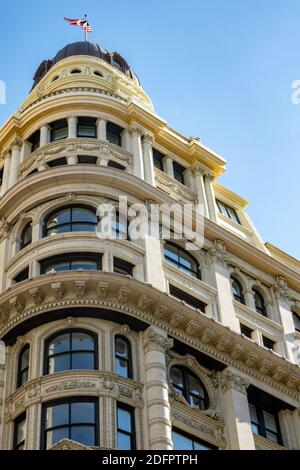 Flatiron Building (Beaux-Arts style) south facade at sunset showcasing ...