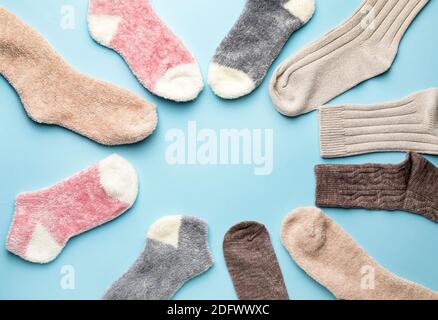 Frame made of socks on color background Stock Photo - Alamy