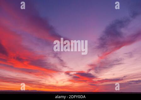 Beautiful purple seascape with dramatic cloudy sky at sunset. Wild ...