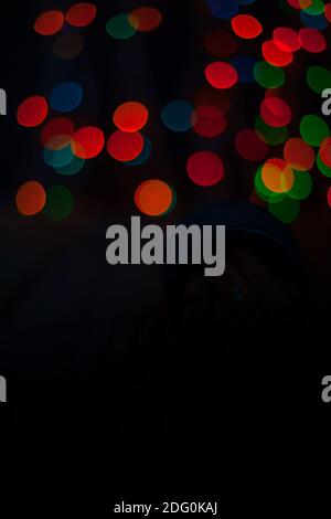 multicolored bokeh from bright colored spotlights in a nightclub in out ...