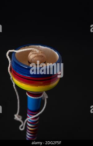 Balero Traditional Mexican handcraft toy , Cup and ball Stock Photo - Alamy