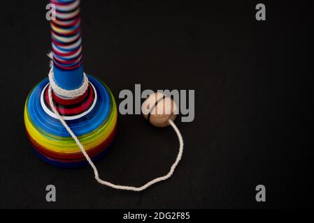 Balero Traditional Mexican handcraft toy , Cup and ball Stock Photo - Alamy