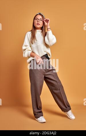 Full body portrait of adorable satisfied lady two hands fingers show v ...