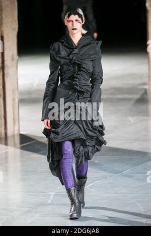 A Model walks the runway during Yohji Yamamoto Womenswear Spring/Summer ...