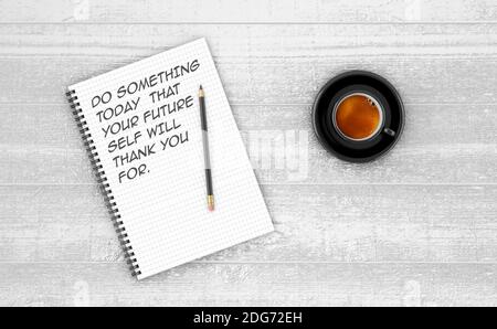 Inspirational quote on notepad Stock Photo - Alamy